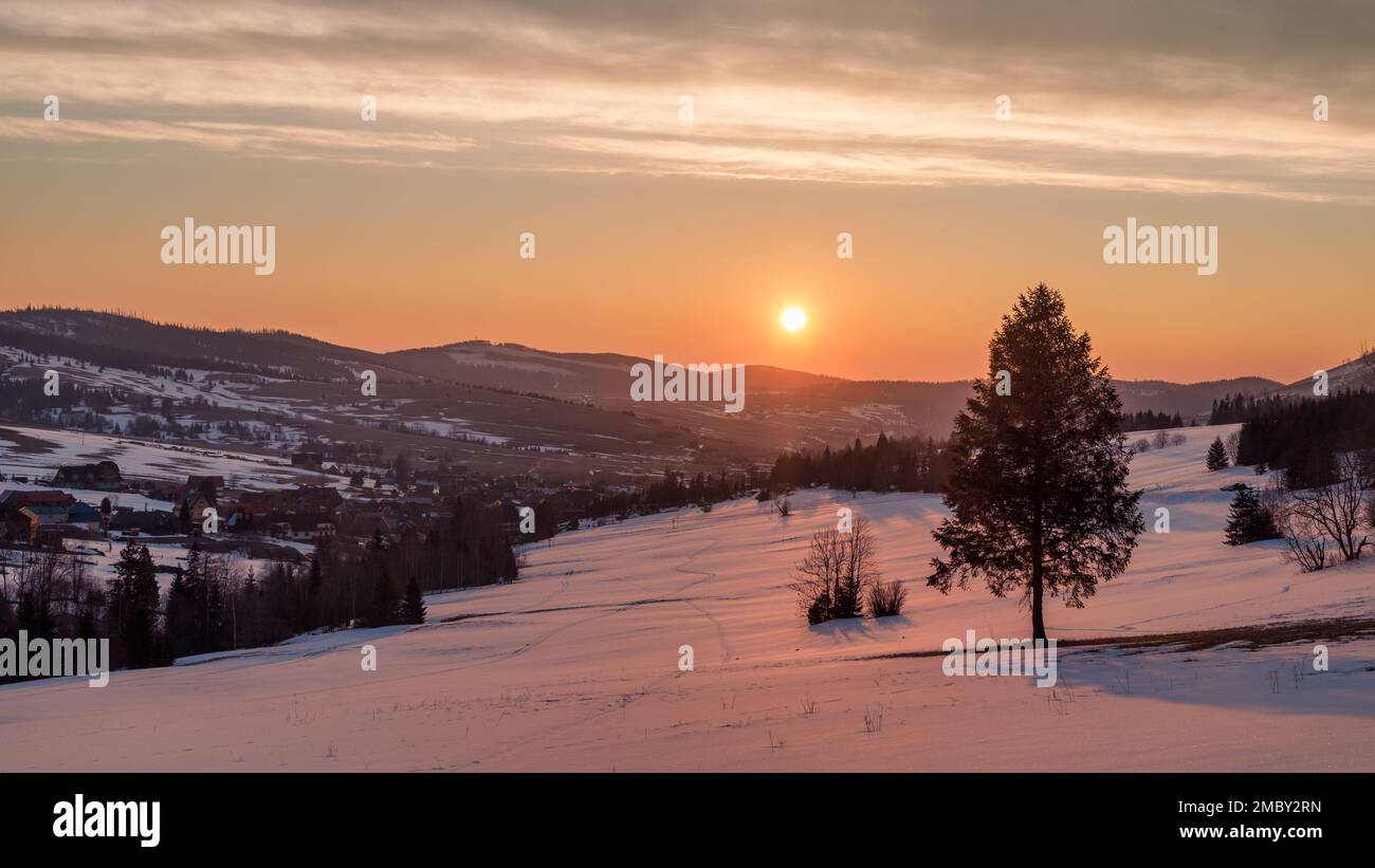 The distinctive village of Zdiar at winter sunrise. High Tatras ...