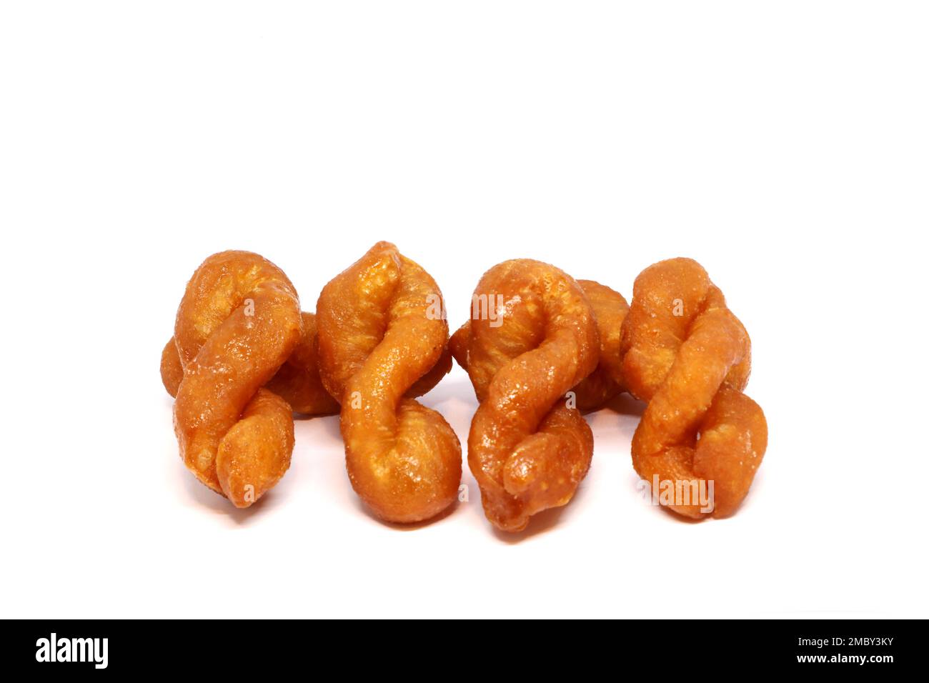 some south african Koeksister pastries isolated on white background ...