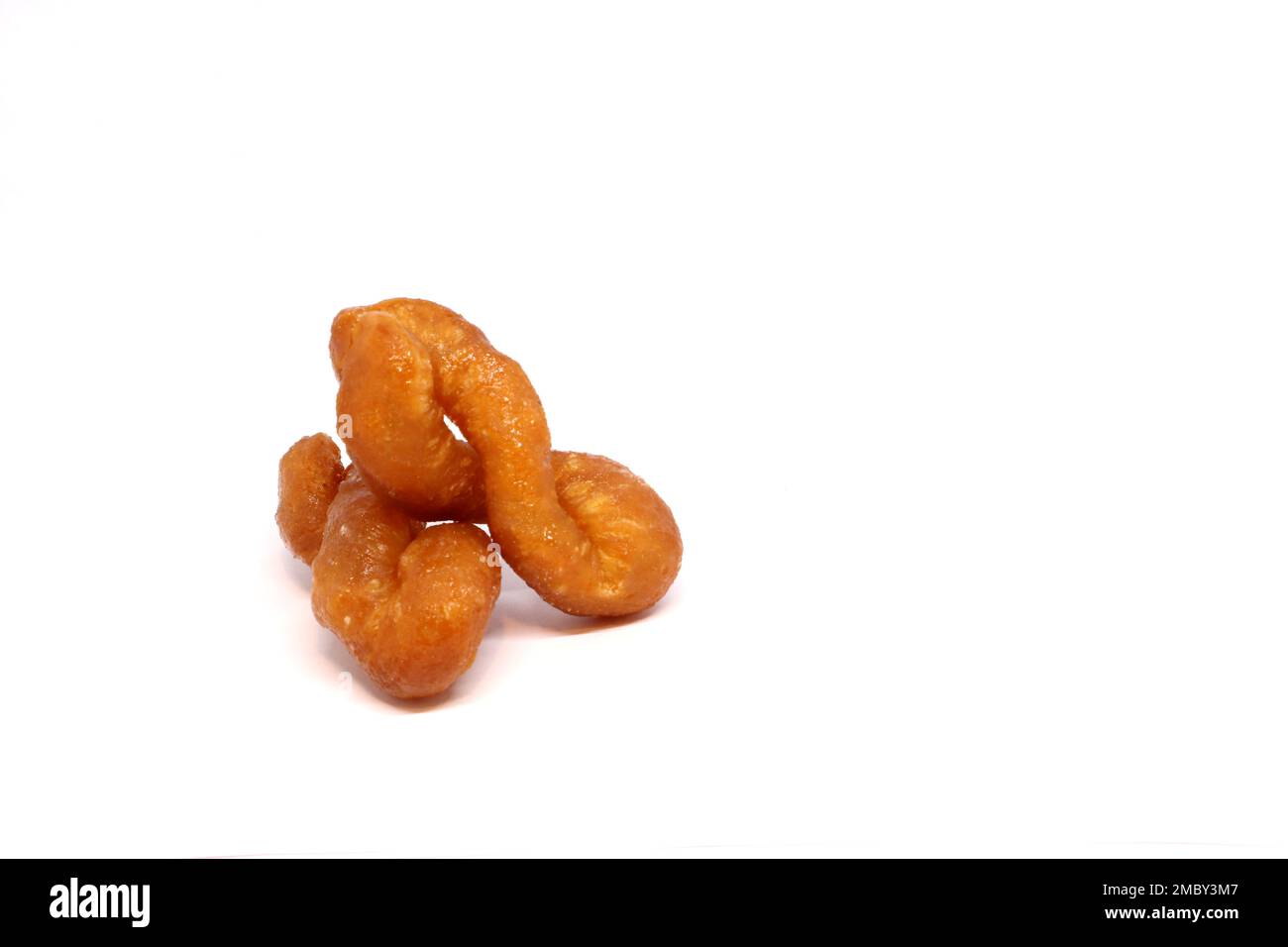 some South african Koeksister pastries isolated on white background ...