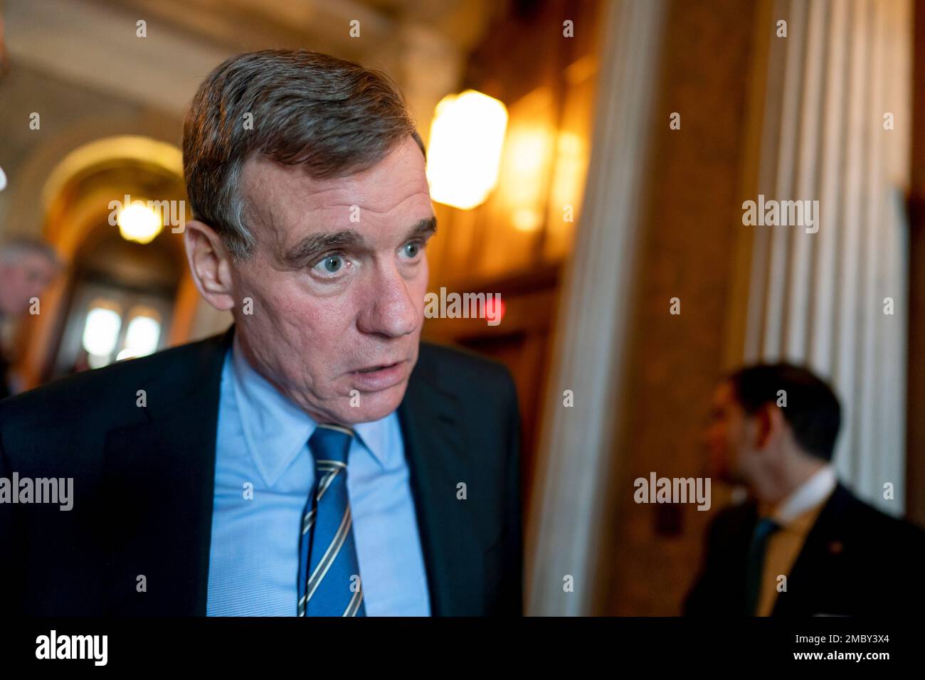Senate Intelligence Committee Chairman Mark Warner, D-Va., stops for a ...