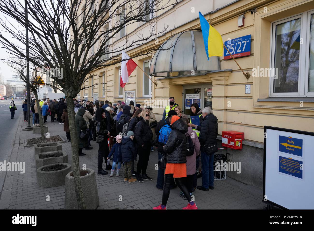 Ukrainians stand in line to apply for a national identity number in ...