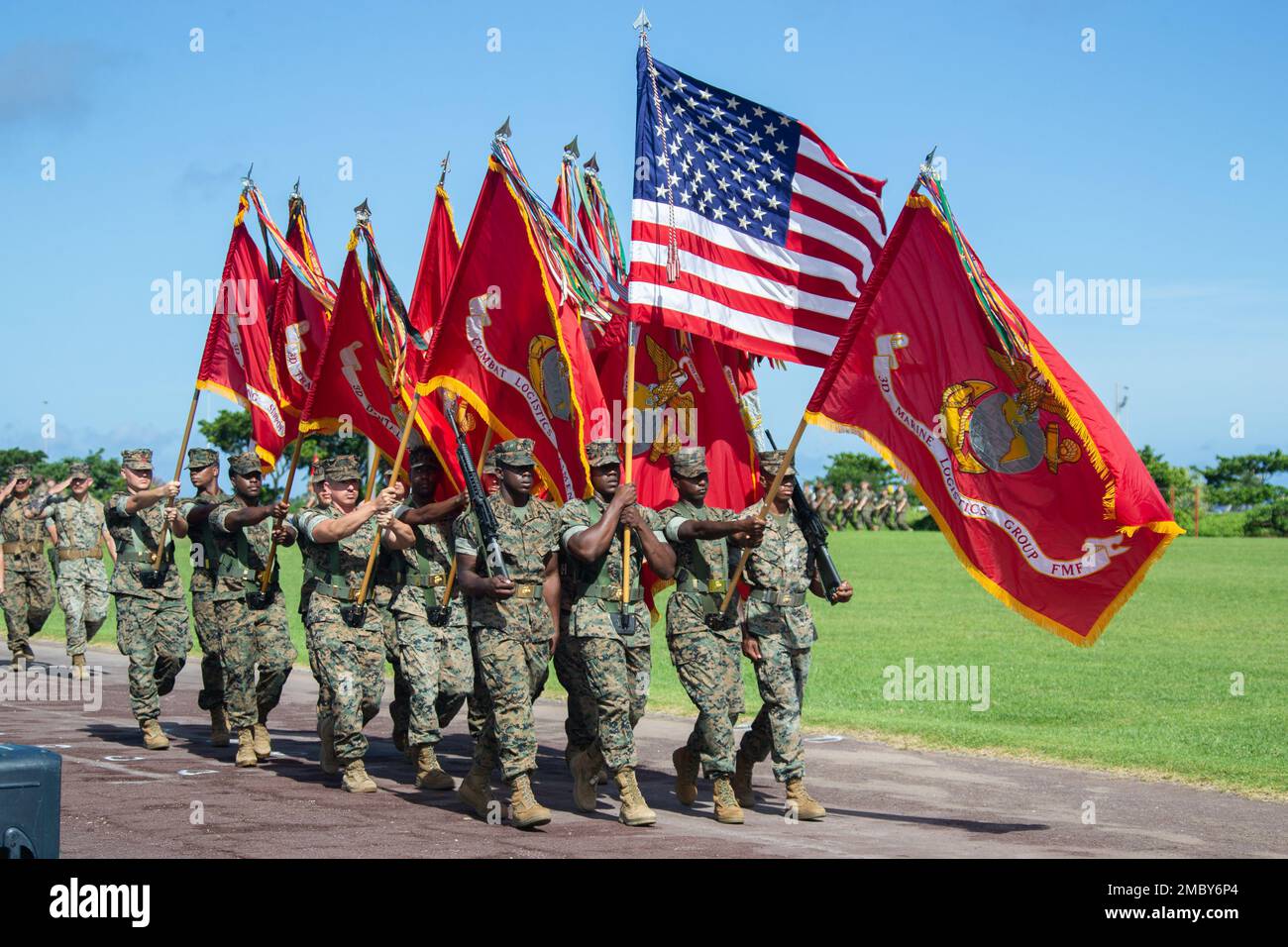 The U.S. Marine Corps 3rd Marine Logistics Group color guard salutes ...