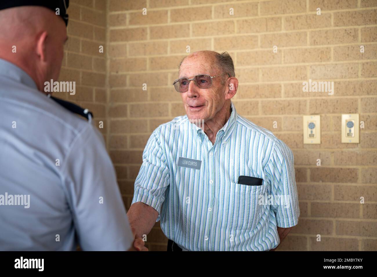 Chief of Space Operations Gen. John W. “Jay” Raymond shakes hands with ...