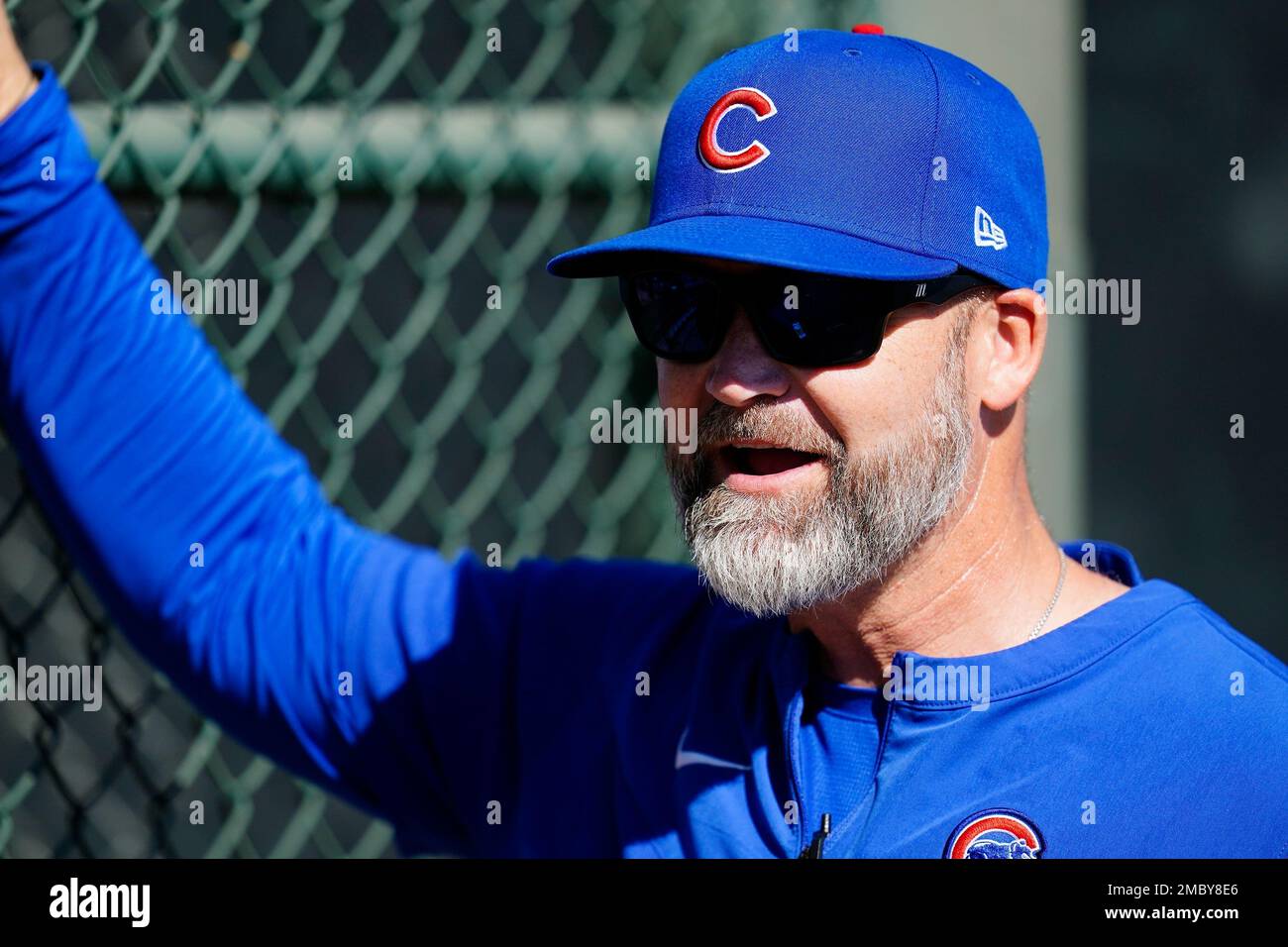 Chicago Cubs manager David Ross watches infield drills during a ...