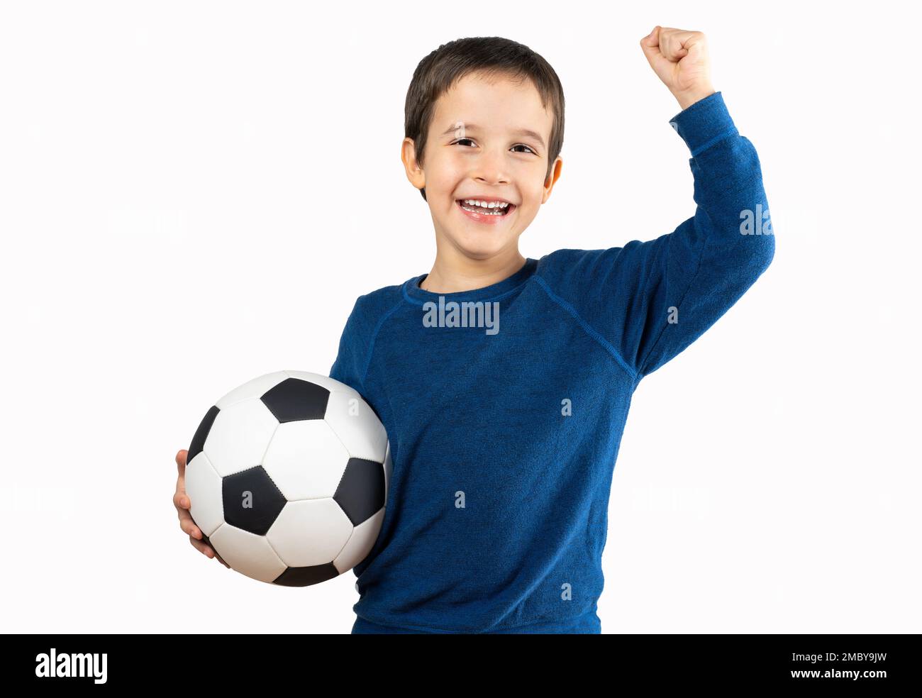 Child holding soccer football ball over isolated white background ...