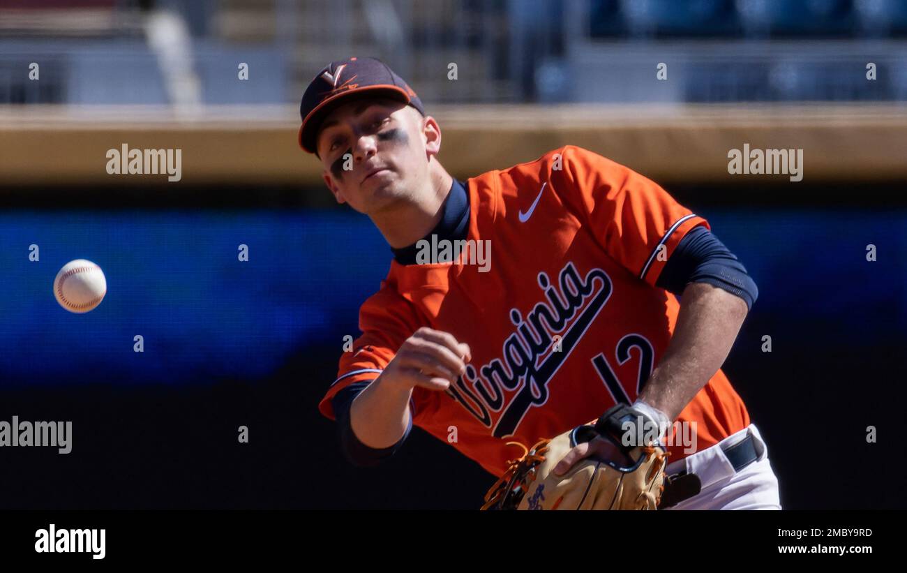 Virginia infielder Justin Rubin #12 throws a ball during an NCAA ...