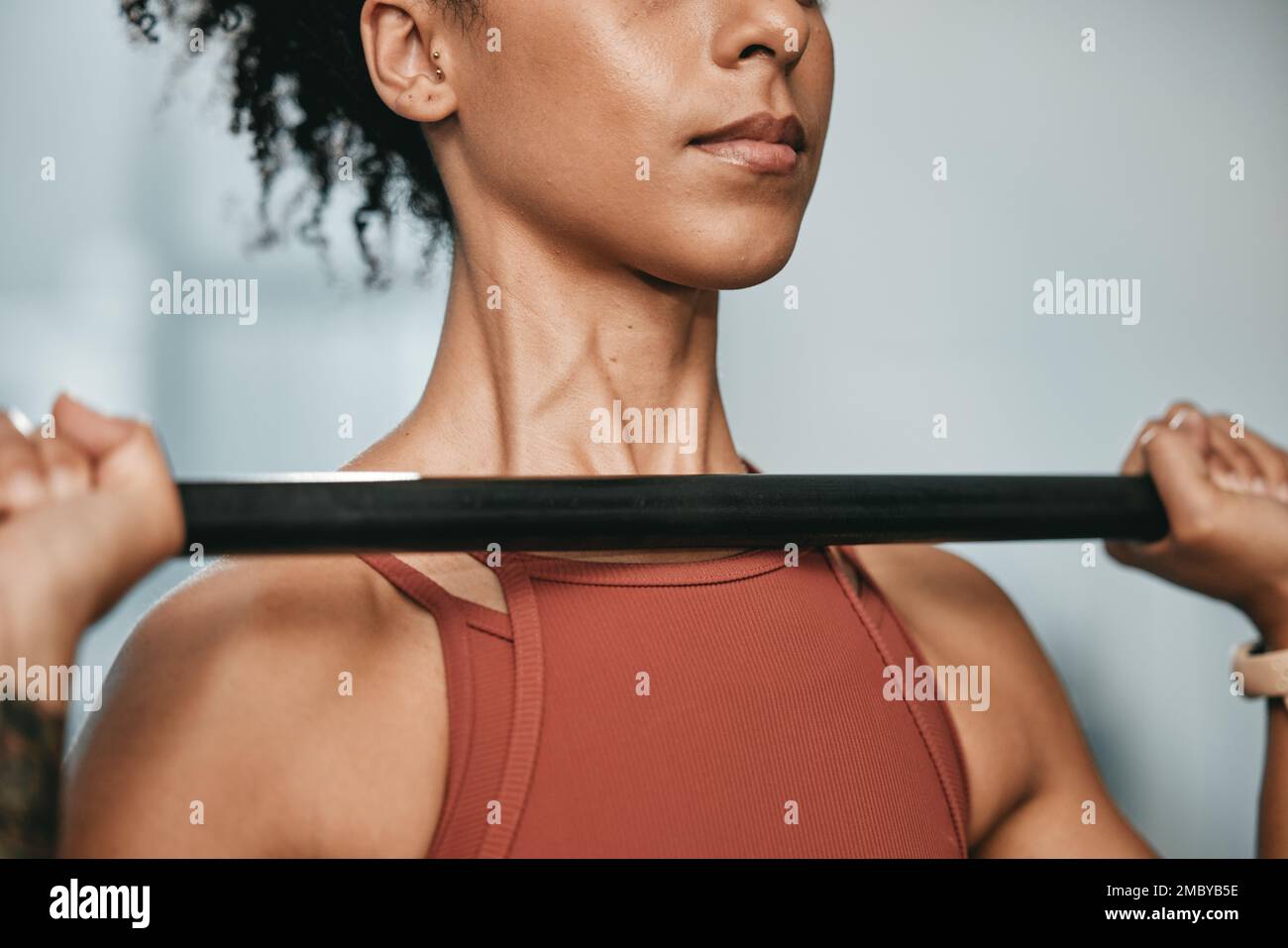 Gym, barbell workout and black woman doing muscle fitness performance ...