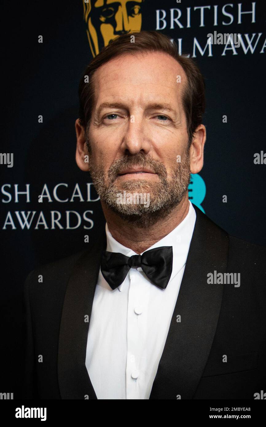 Kevin Ulrich poses for photographers upon arrival at the 75th British ...