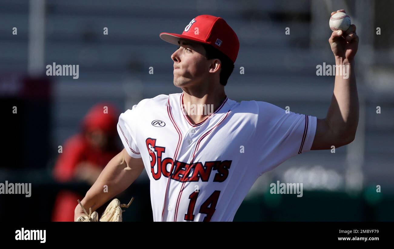 St John's pitcher Ben Adams pitches against Manhattan during an NCAA ...