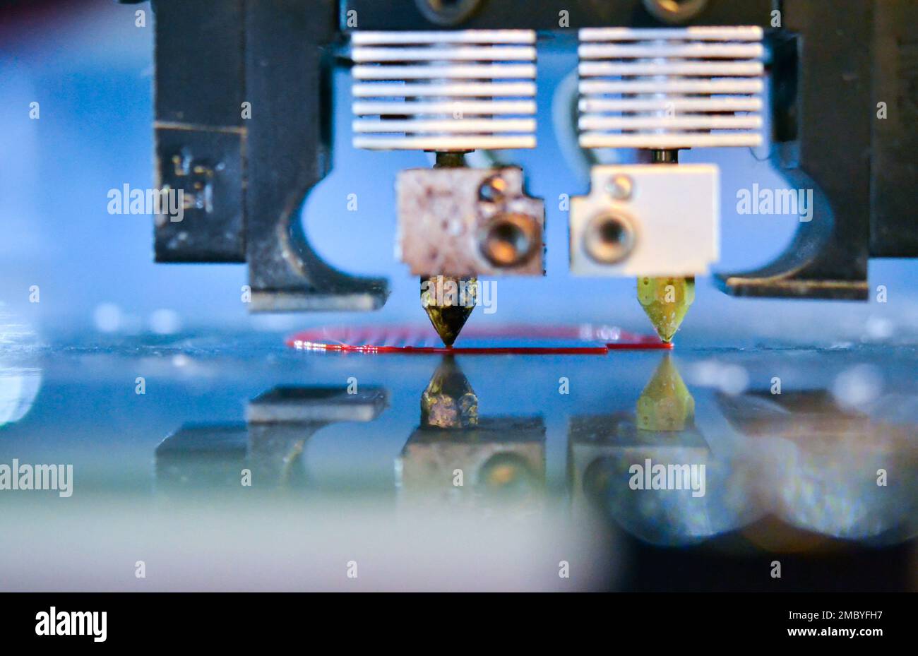 3d printer printing a model close-up. The process of printing a model ...