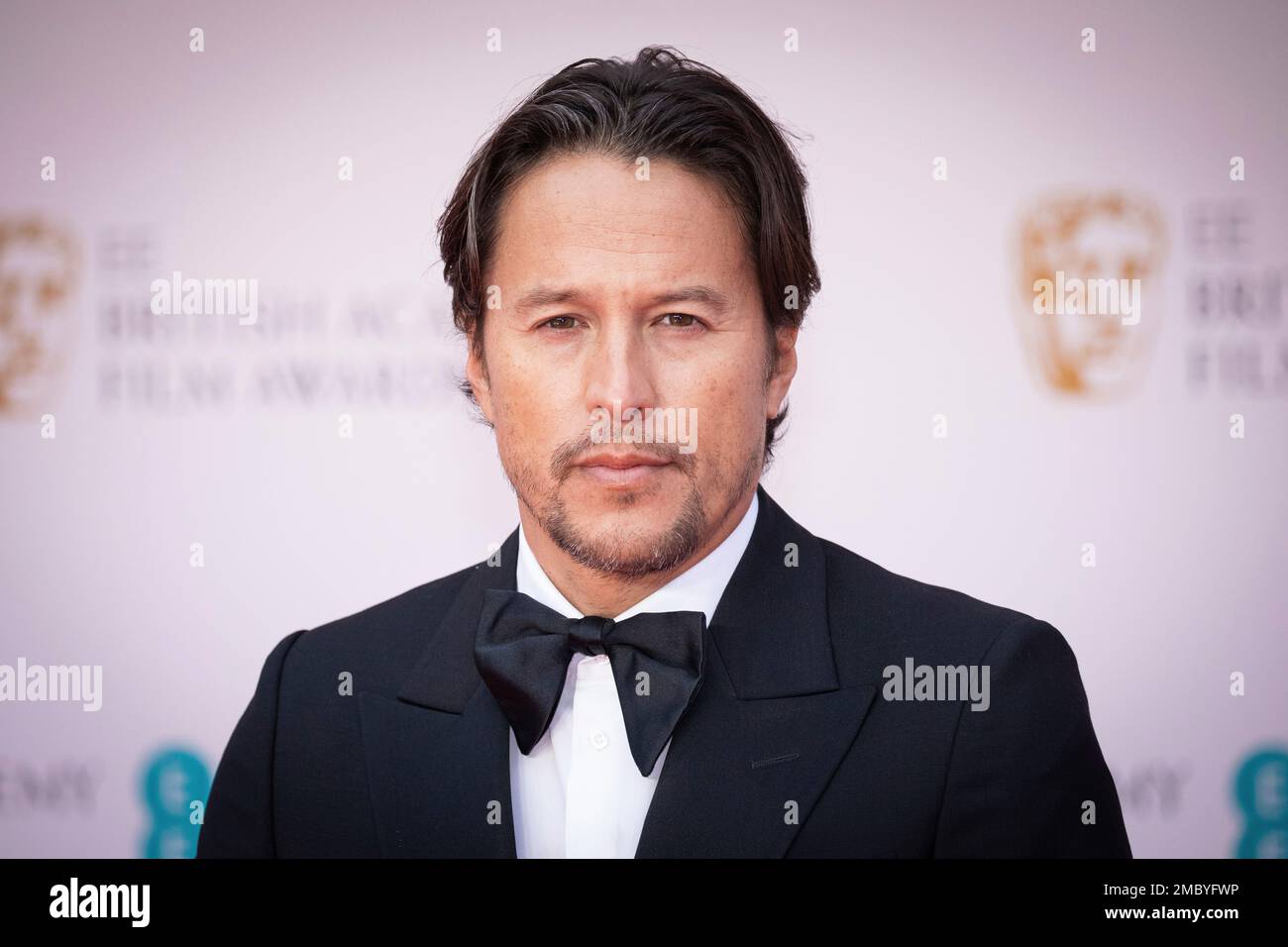 Cary Joji Fukunaga poses for photographers upon arrival at the 75th ...