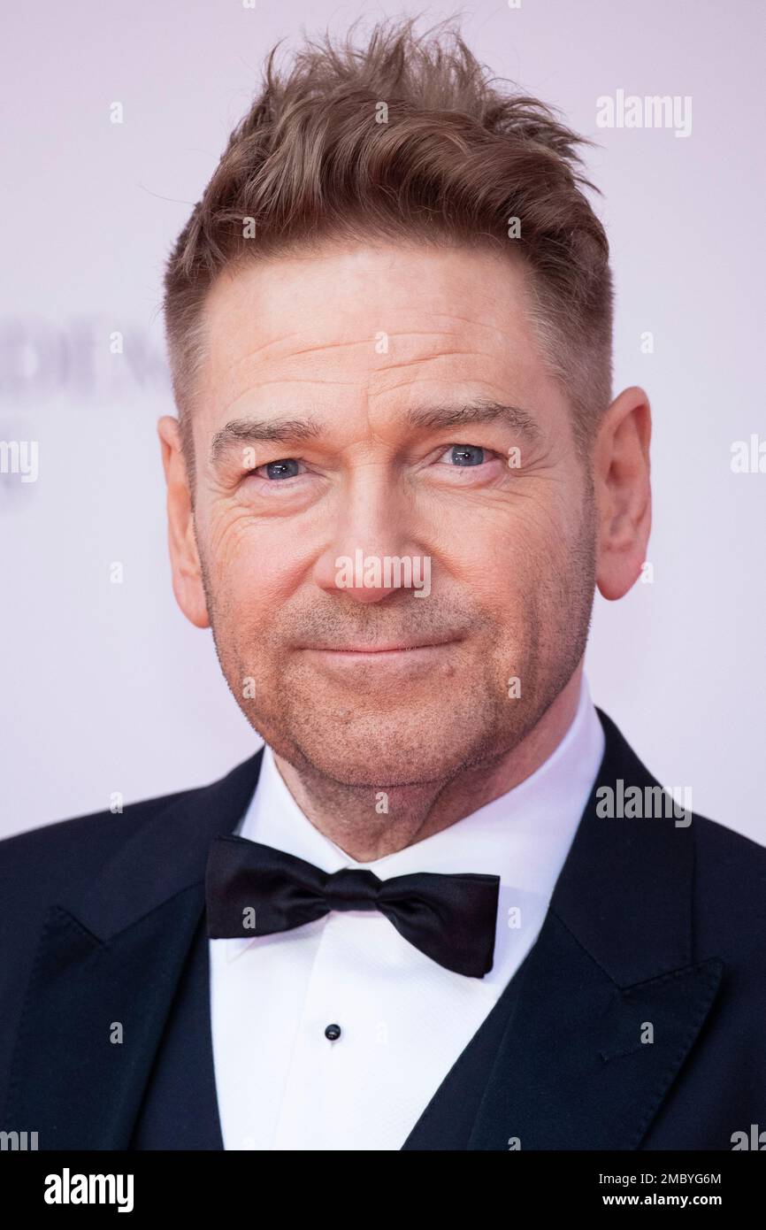 Kenneth Branagh poses for photographers upon arrival at the 75th ...