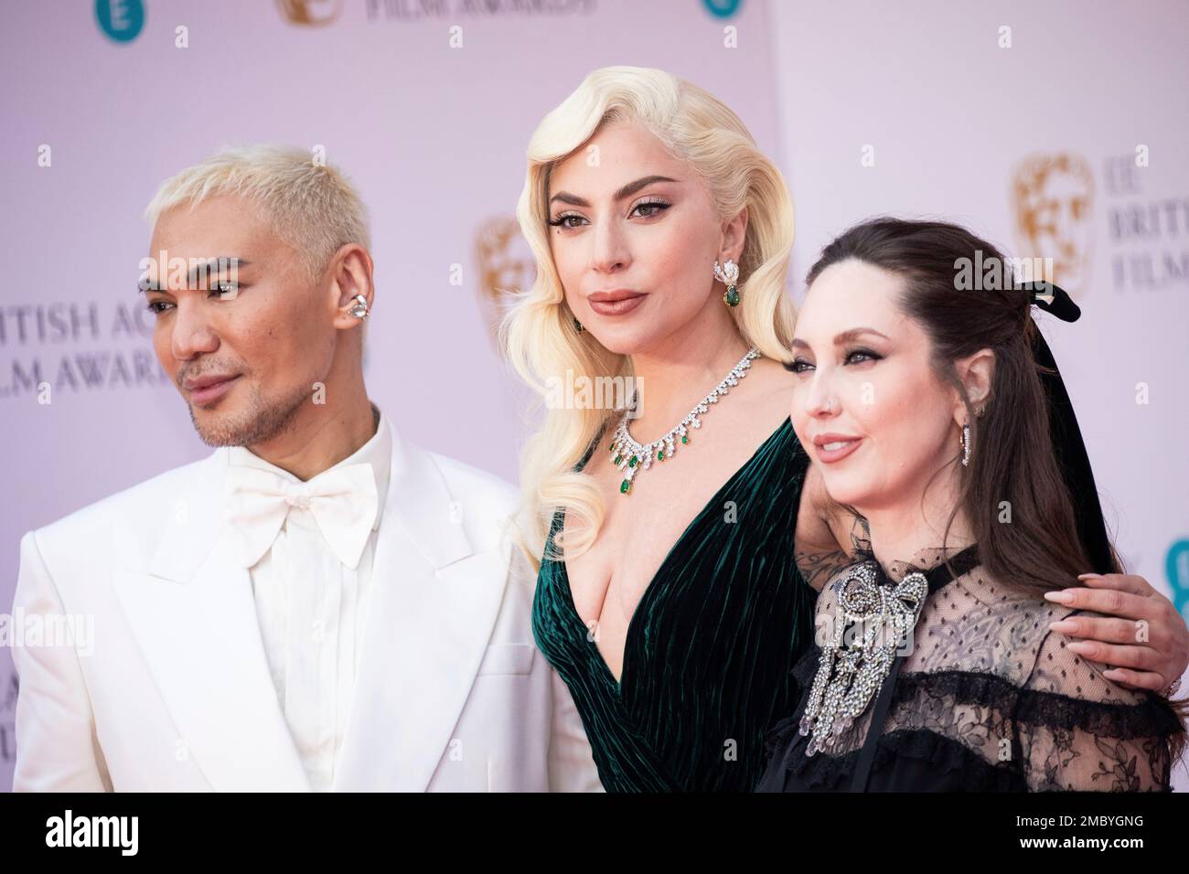 Frederic Aspiras, Lady Gaga and Sarah Tanno pose for photographers upon ...