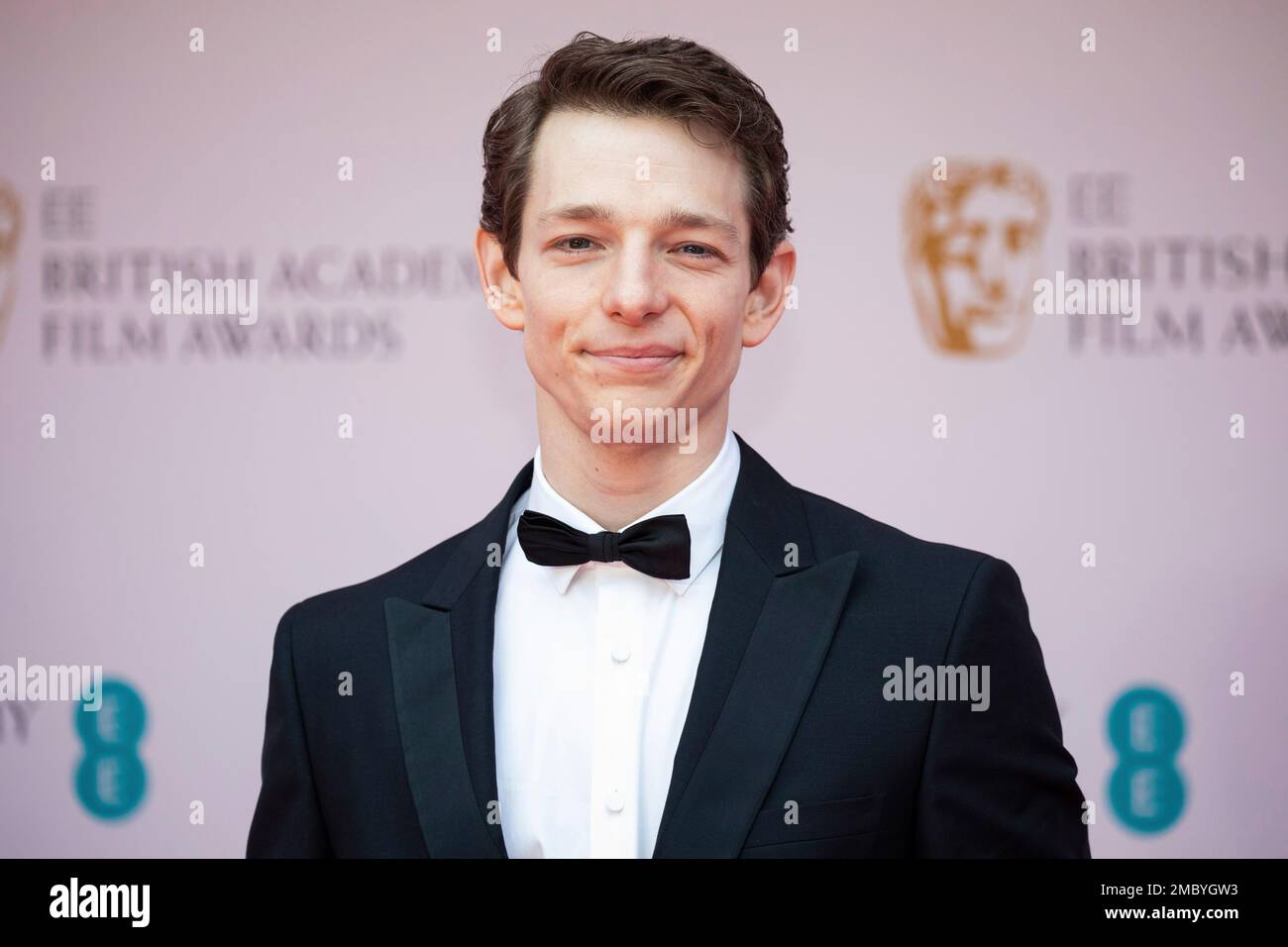 Mike Faist poses for photographers upon arrival at the 75th British ...