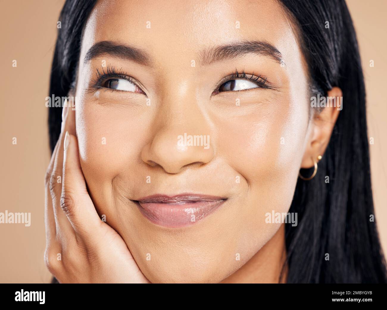 Woman, studio and skincare with makeup thinking, natural aesthetic and healthy cosmetic glow by ...