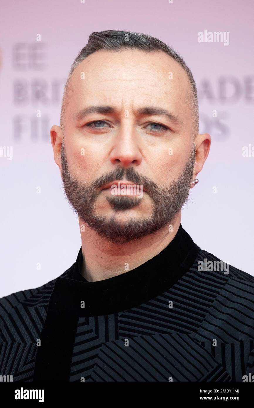 Massimo Cantini Parrini poses for photographers upon arrival at the ...