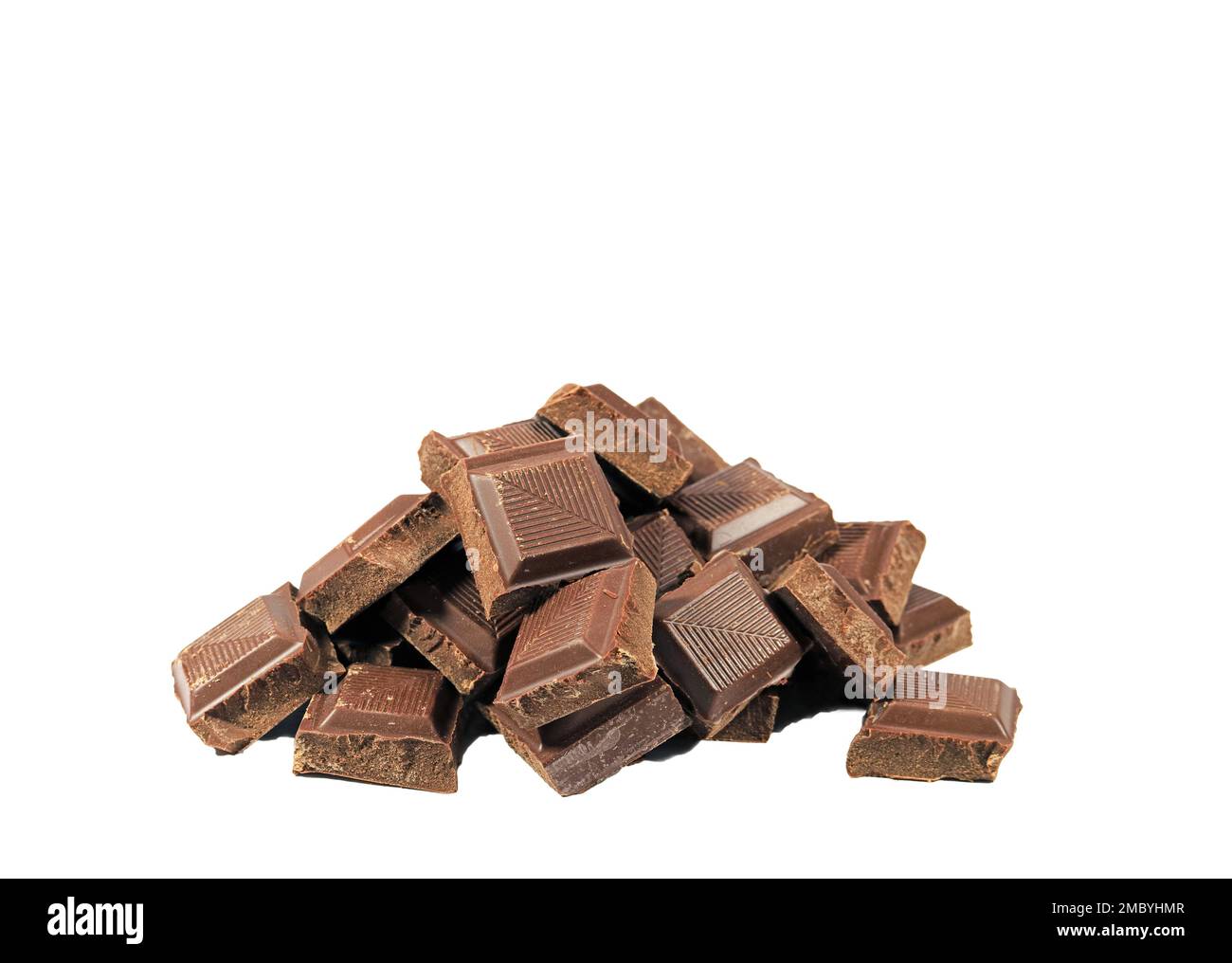 Pile of delectable chocolate chunks on white background Stock Photo - Alamy