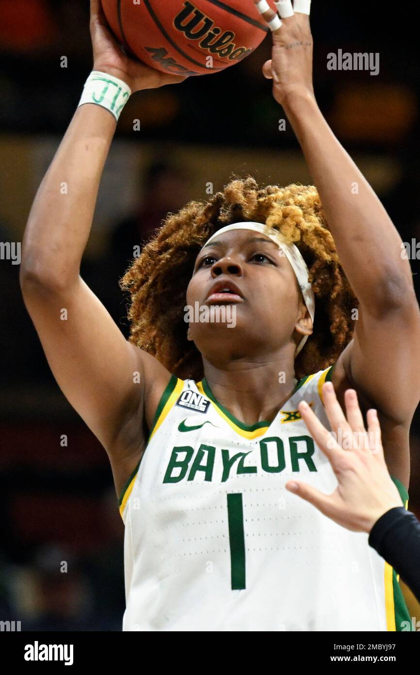 Baylor forward NaLyssa Smith goes up for a shot against Oklahoma State ...