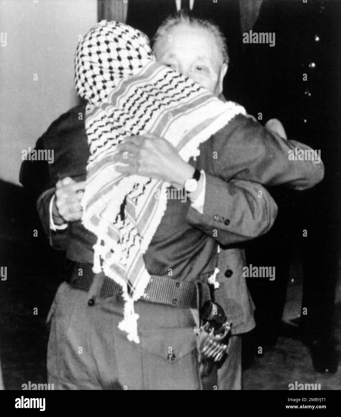 China's senior leader Deng Xiaoping gets a hug from pistol toting PLO ...