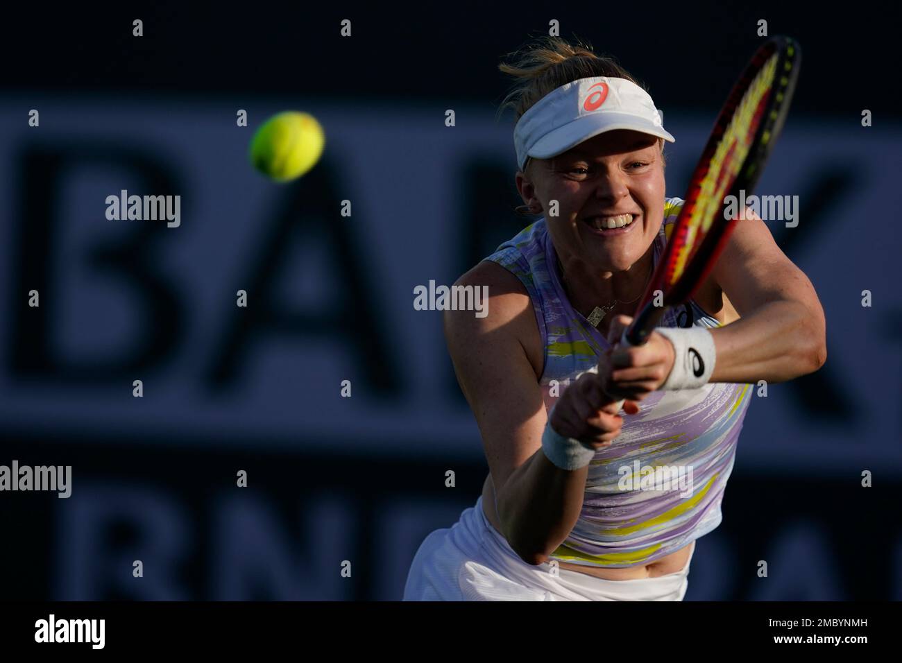 Harriet Dart, of Britain, returns to Kaia Kanepi, of Estonia, at the ...