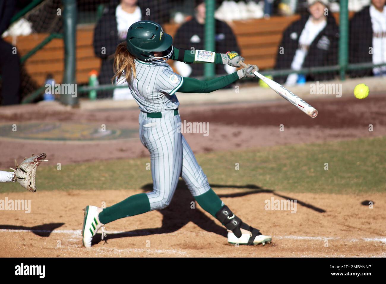 George Mason infielder Marlaina Bozek (21) takes a swing during an NCAA ...