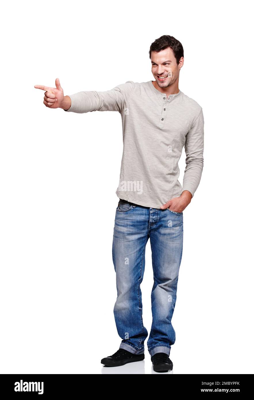 Happy, idea and man pointing hand in direction with excited, curious ...