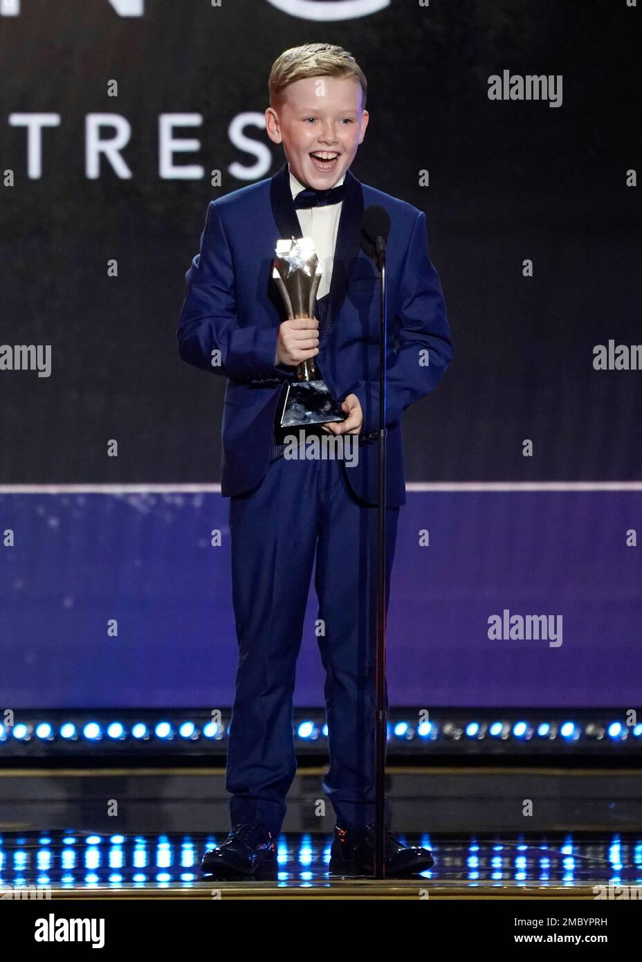 Jude Hill accepts the award for young actor/actress for "Belfast" at the 27th annual Critics ...