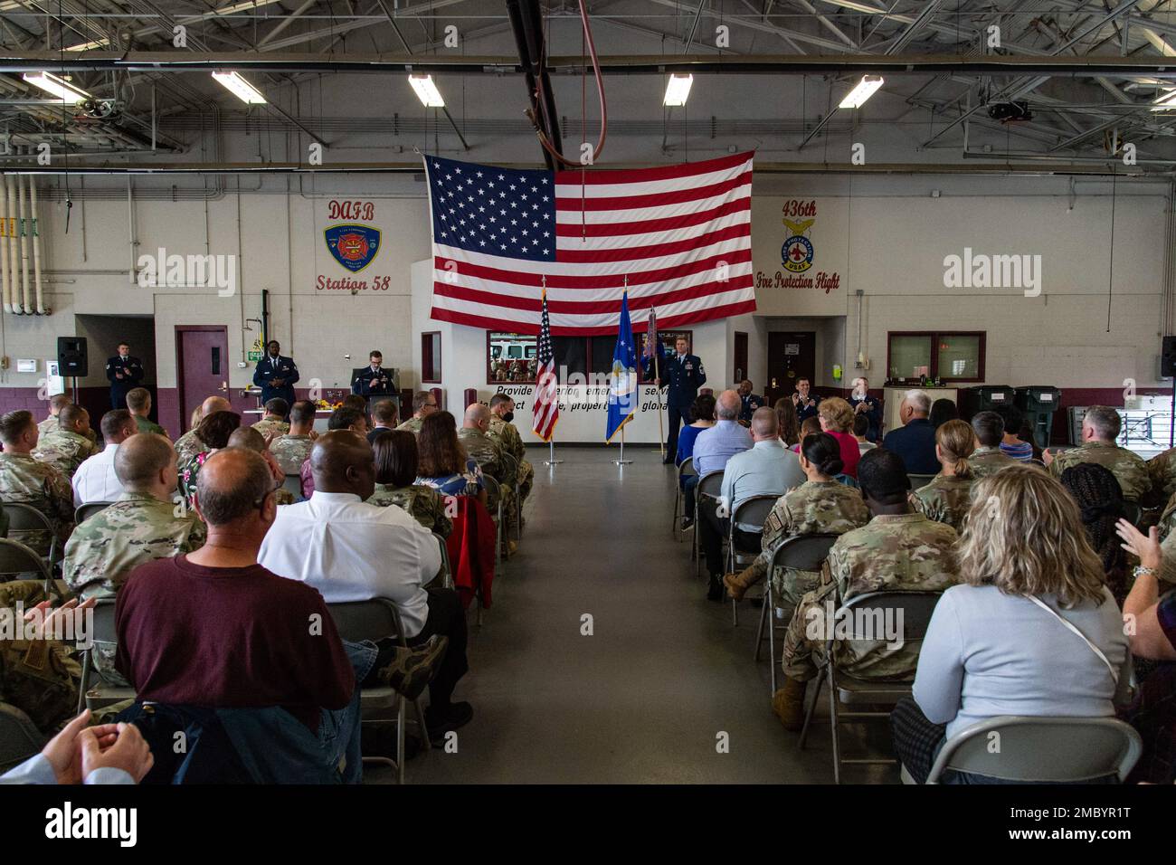 Team Dover Airmen, family members and guests witness the 436th Civil ...