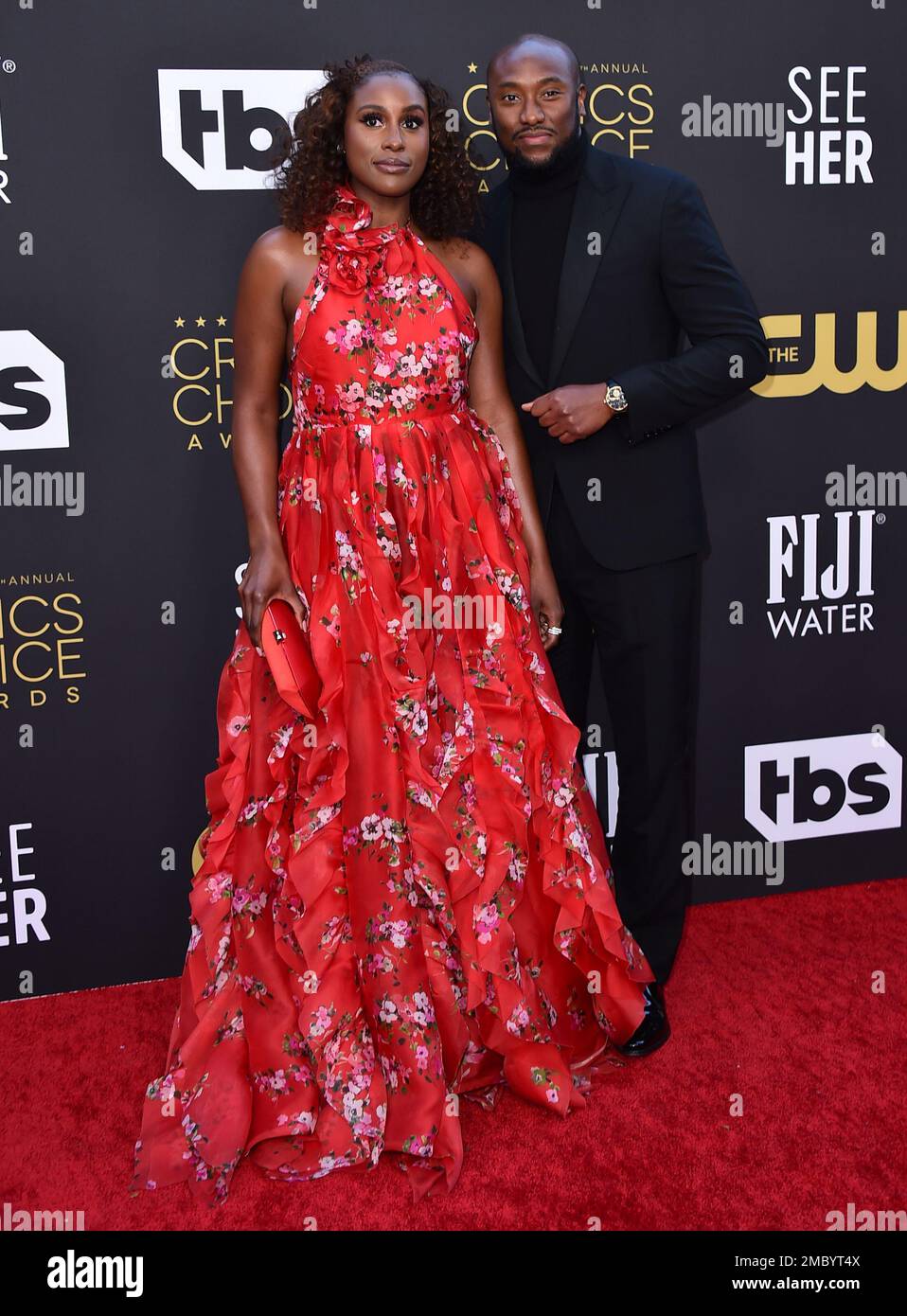 Issa Rae, left, and Louis Diame arrive at the 27th annual Critics ...