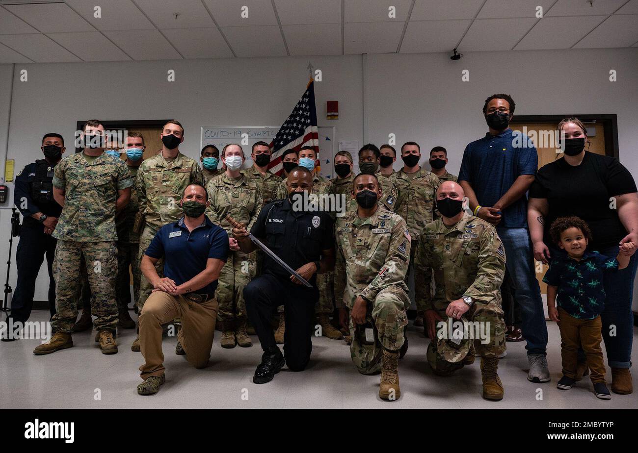 Mykul Thomas, Federal Police officer, and Col. Marcus Jackson, Space ...