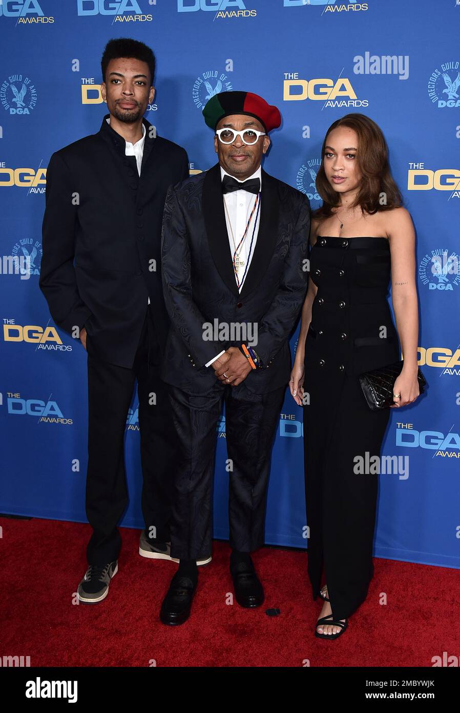 Spike Lee, center, arrives with his son Jackson Lee, left, and his ...