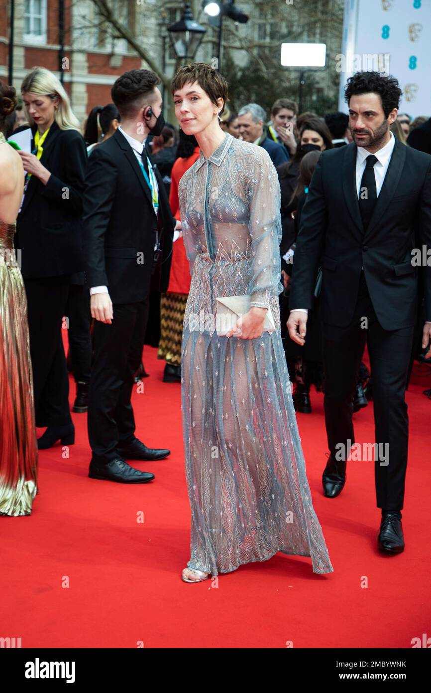 Rebecca Hall poses for photographers upon arrival at the 75th British ...