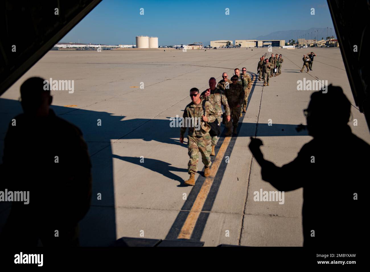 U.S. Air Force Airman with 163d Attack Wing board HC-130J Combat King ...