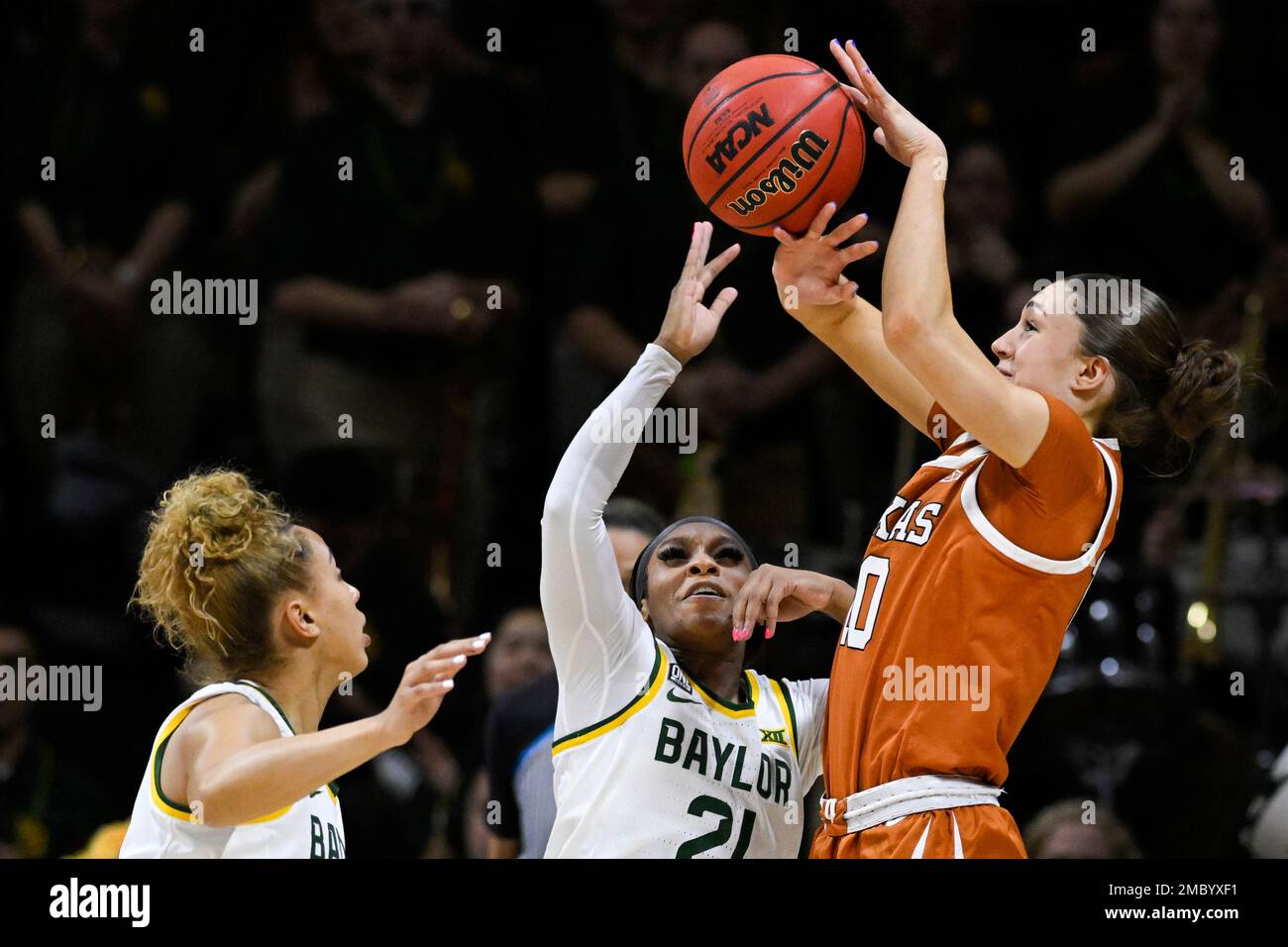 Texas guard Shay Holle (10), Baylor guard Ja'Mee Asberry (21) and ...