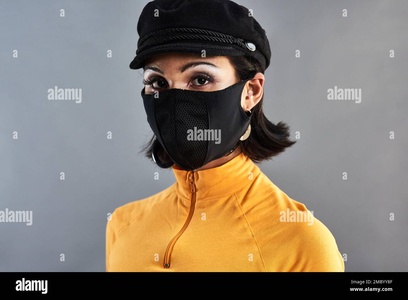 Curb the spread, stay on trend. Studio shot of a beautiful young woman ...