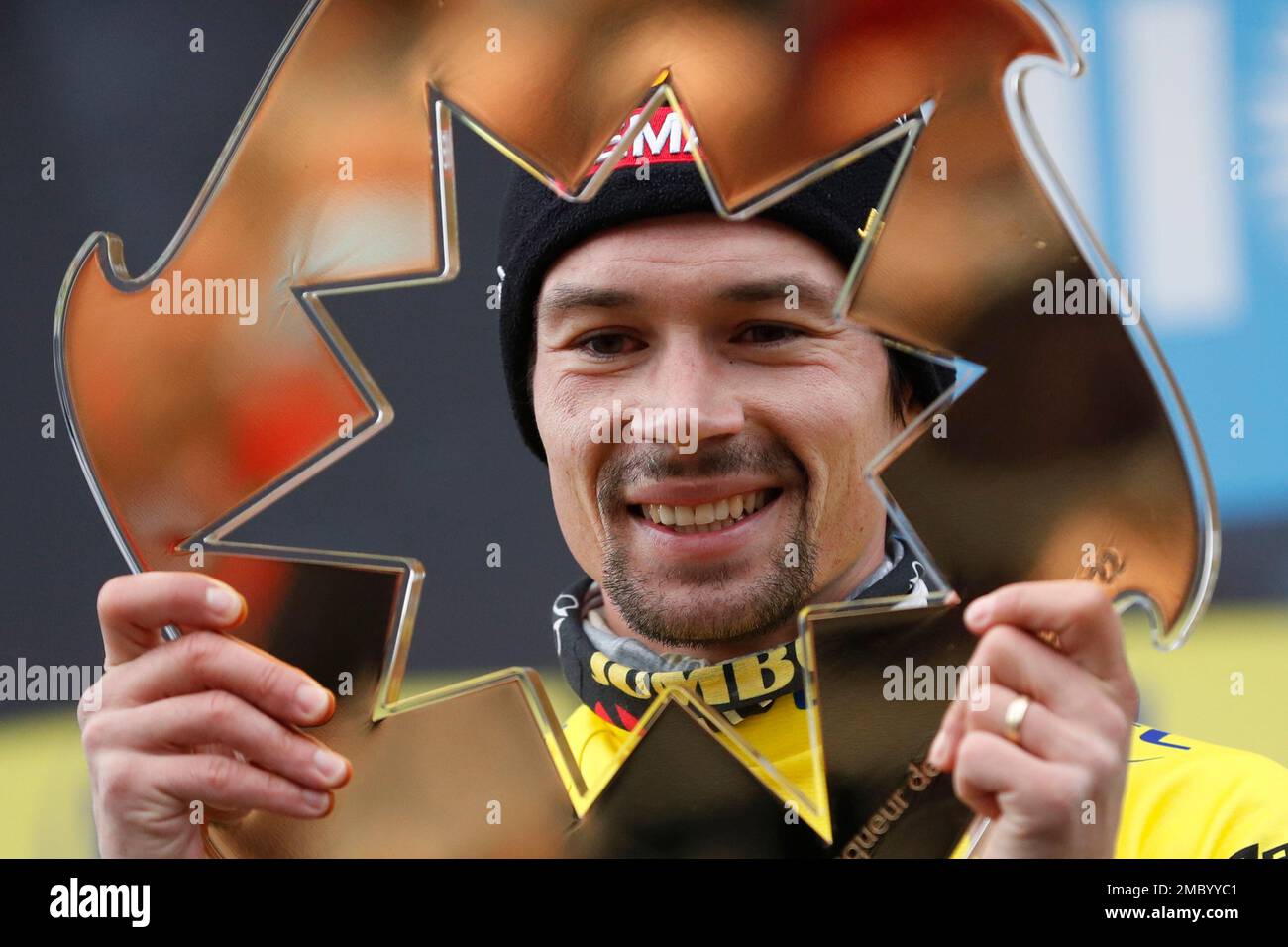Slovenian rider Primoz Roglic of Jumbo Visma celebrates on the podium ...