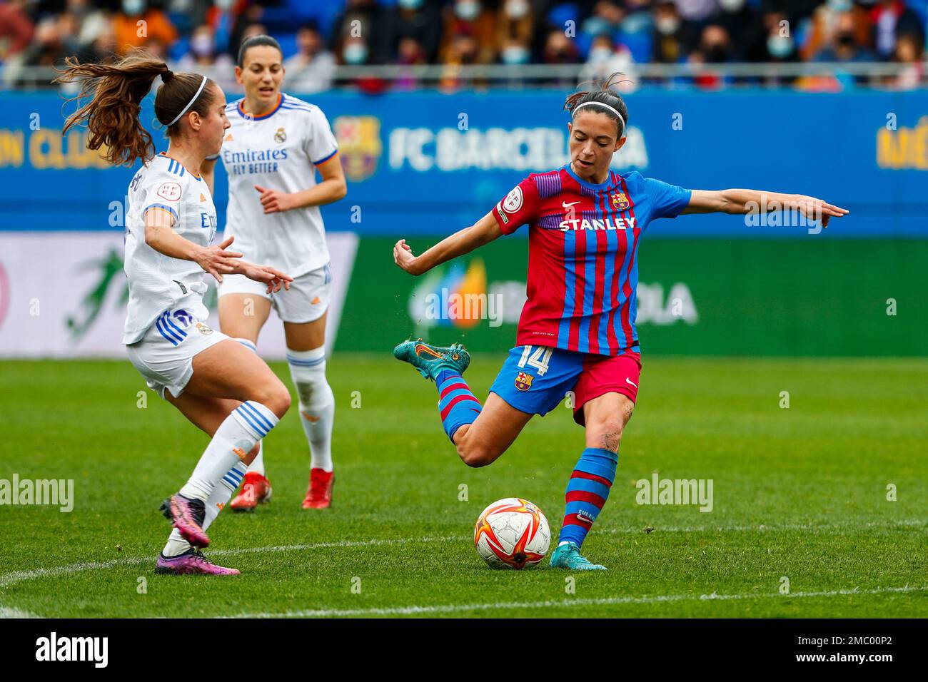 Barcelona's Aitana Bonamati, right, shoots the ball next to Real Madrid ...