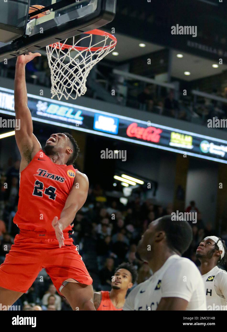 Cal State Fullerton forward E.J. Anosike (24) lays up the ball during ...