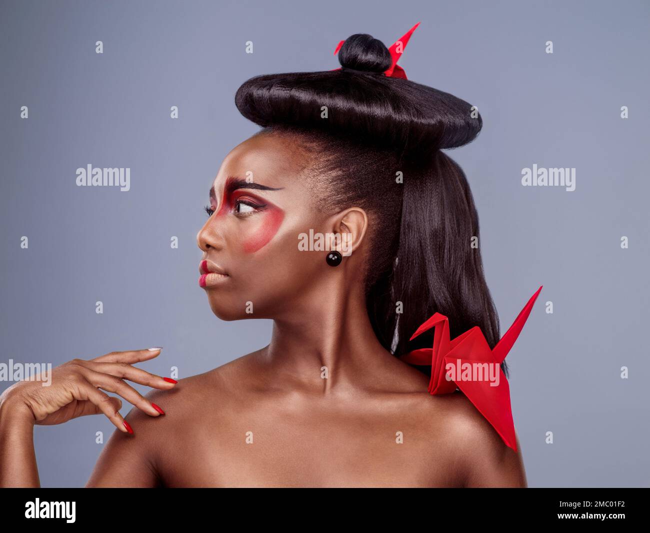 Embracing different cultures is a beautiful thing. Studio shot of a ...