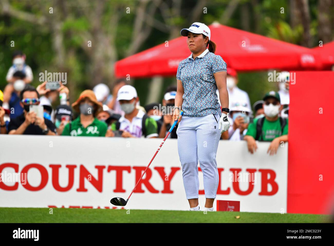 of Japan prepares to tee off the 1st hole during the final round of the ...