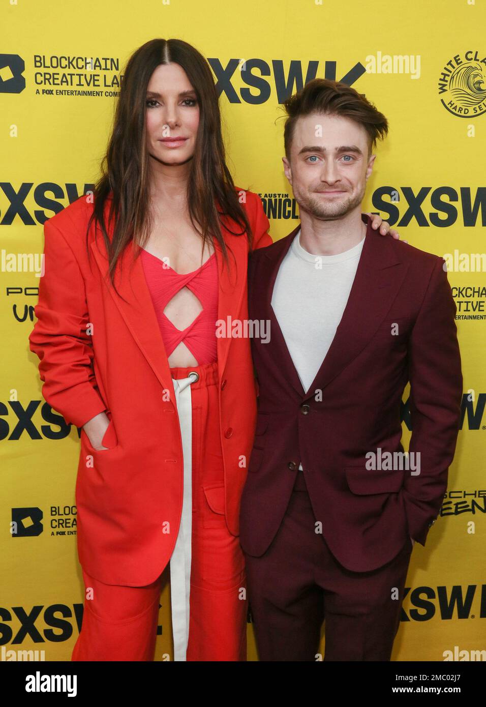 Sandra Bullock, left, and Daniel Radcliffe arrive for the world ...