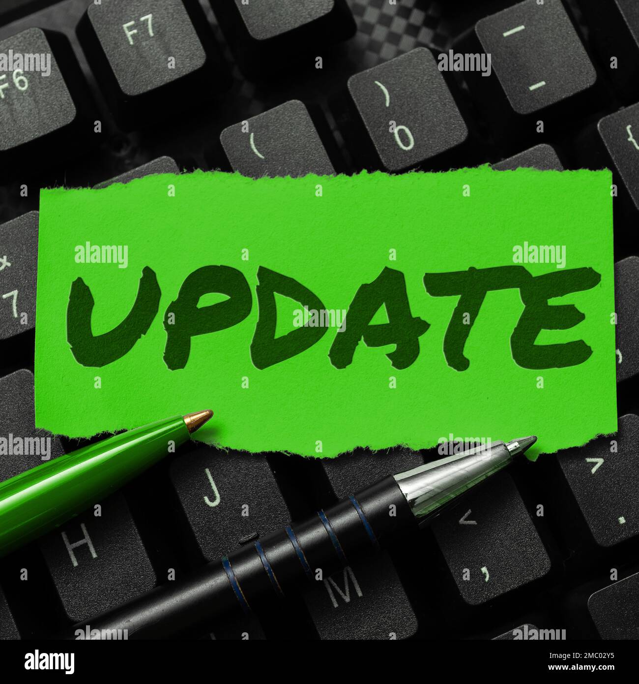 Hand writing sign Update. Business concept Up to date Make something more modern or updated ...