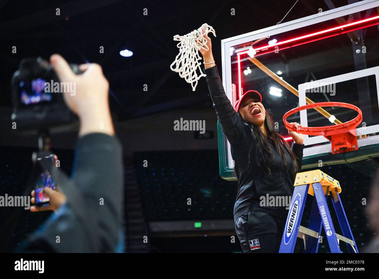 Jackson State head coach Tomekia Reed cuts down the net after winning ...