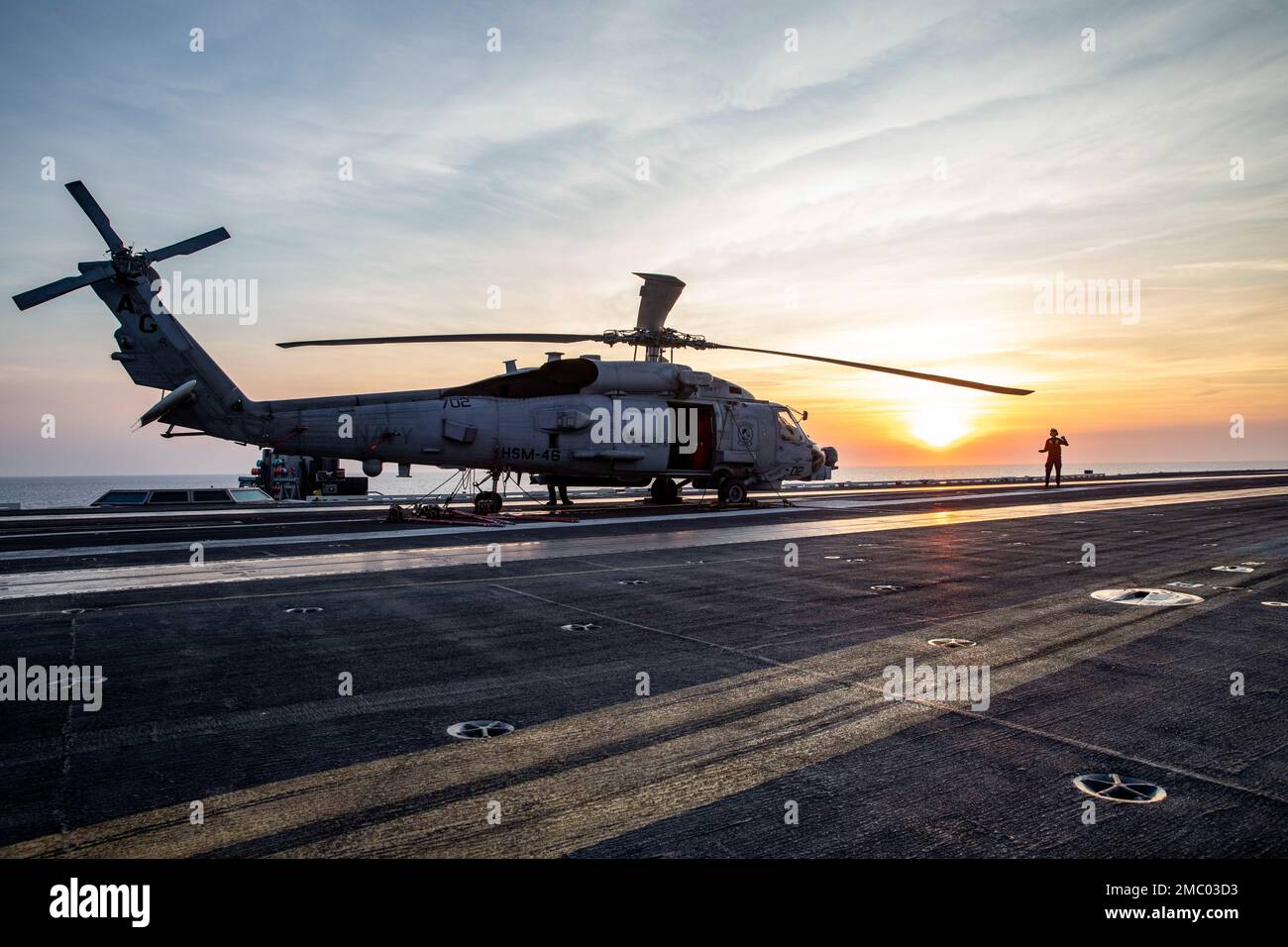 220623-N-OL632-2008 ATLANTIC OCEAN (June 23, 2022) A Sailor signals an ...