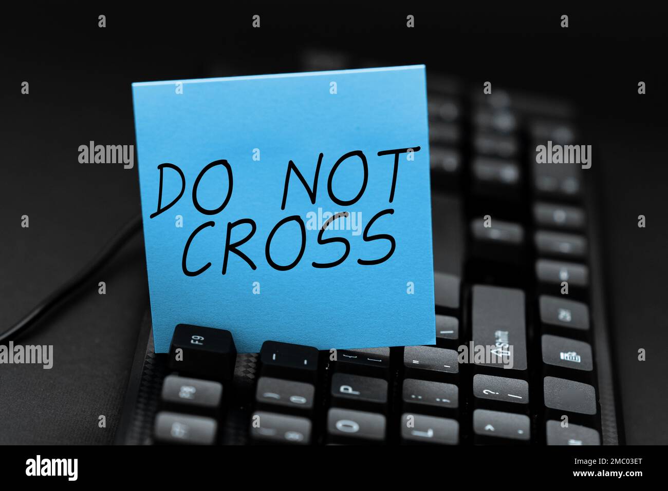 Sign displaying Do Not Cross. Word Written on Crossing is forbidden ...