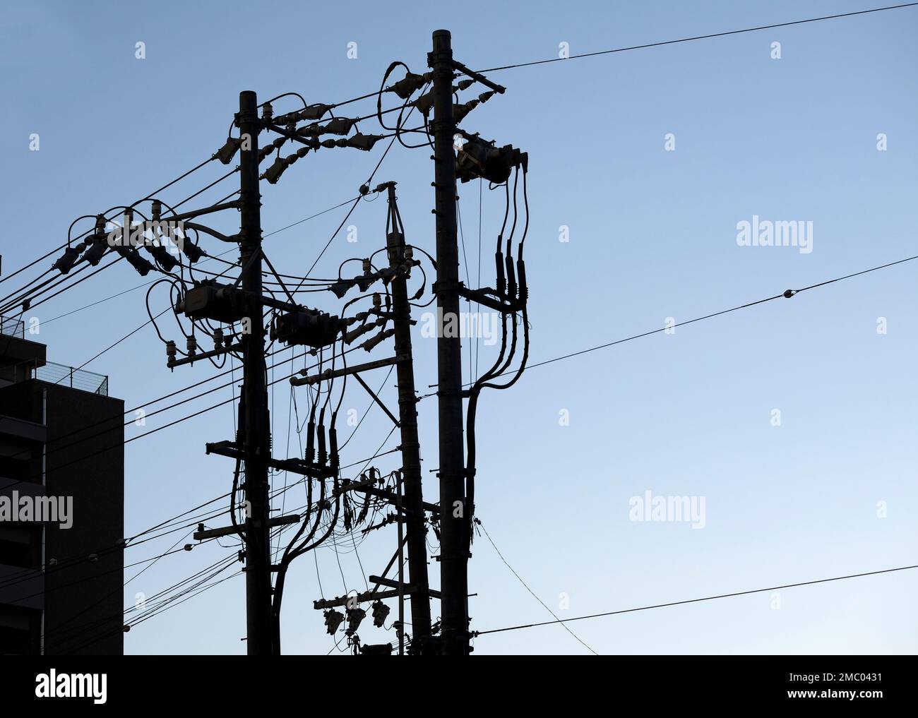 Power lines in Japan in the evening hours Stock Photo - Alamy