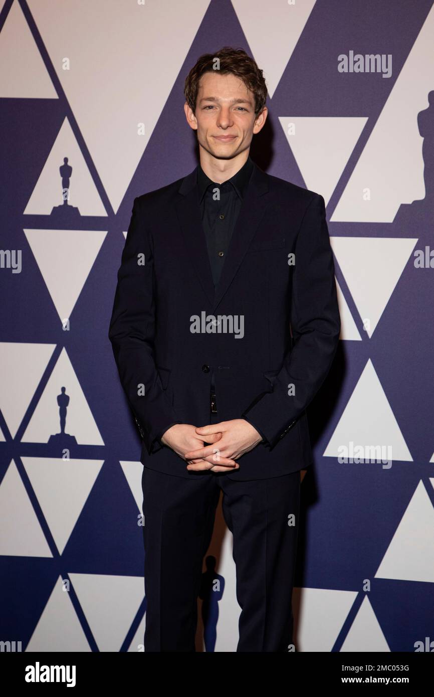 Mike Faist poses for photographers upon arrival at the Academy Awards ...