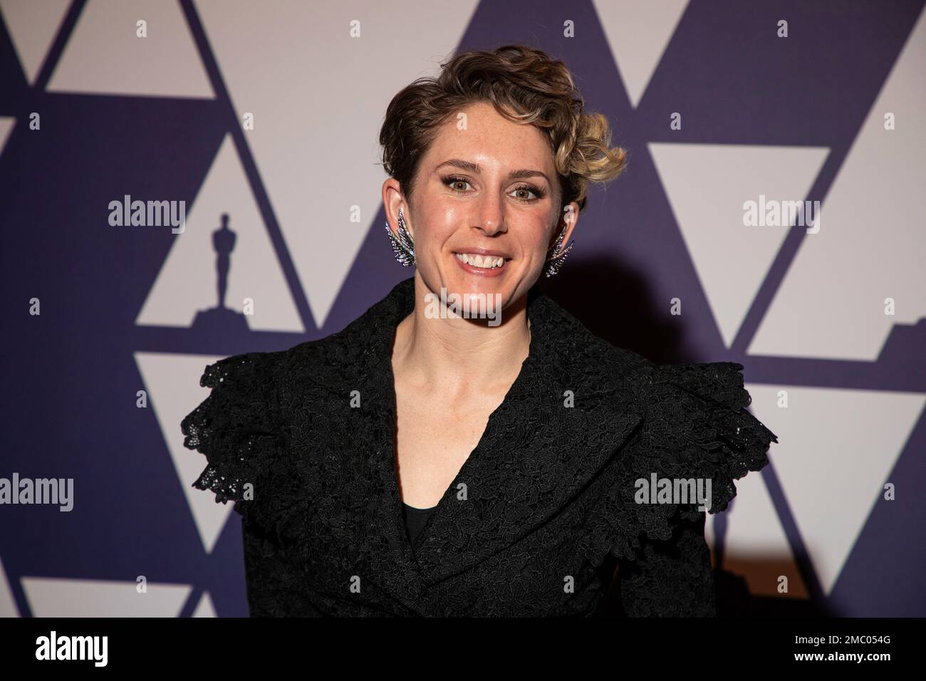 Ari Wegner poses for photographers upon arrival at the Academy Awards ...