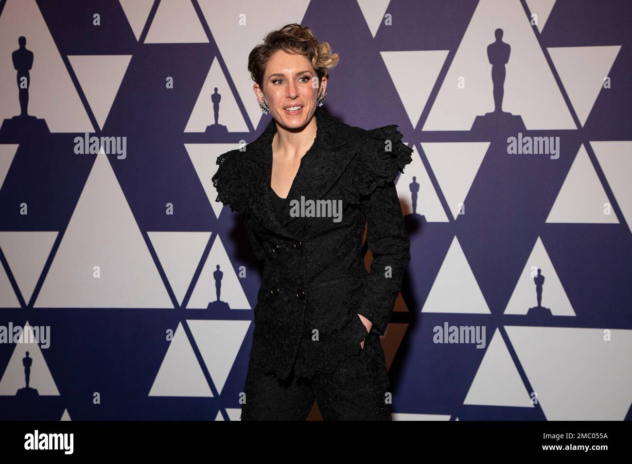 Ari Wegner poses for photographers upon arrival at the Academy Awards ...