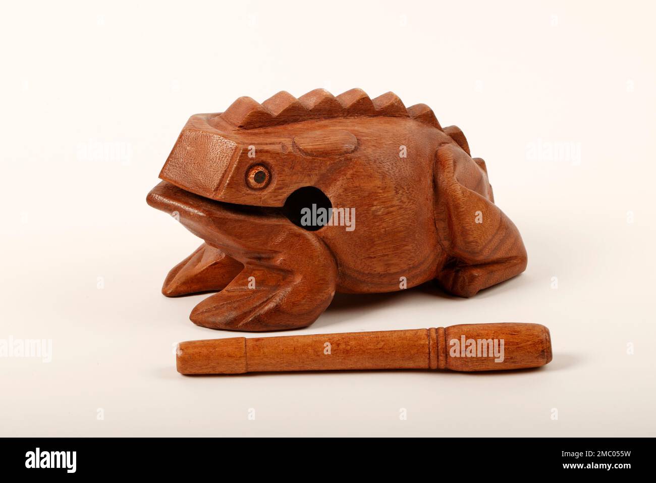 Large wooden Frog scraper guiro Stock Photo - Alamy